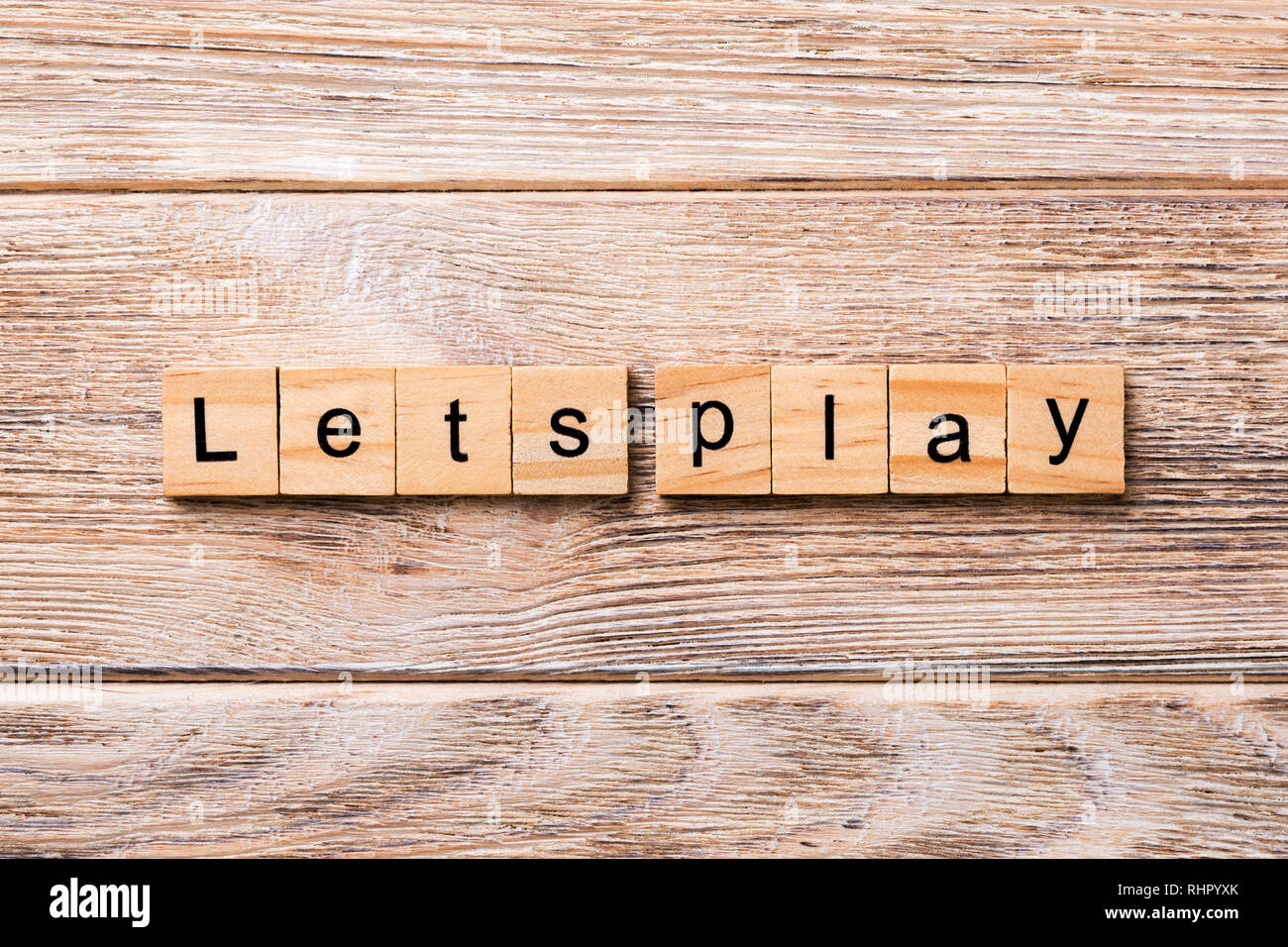 Lets Play Word Written On Wood Block Lets Play Text On Wooden Table lets-play-word-written-on-wood-block-lets-play-text-on-wooden-table