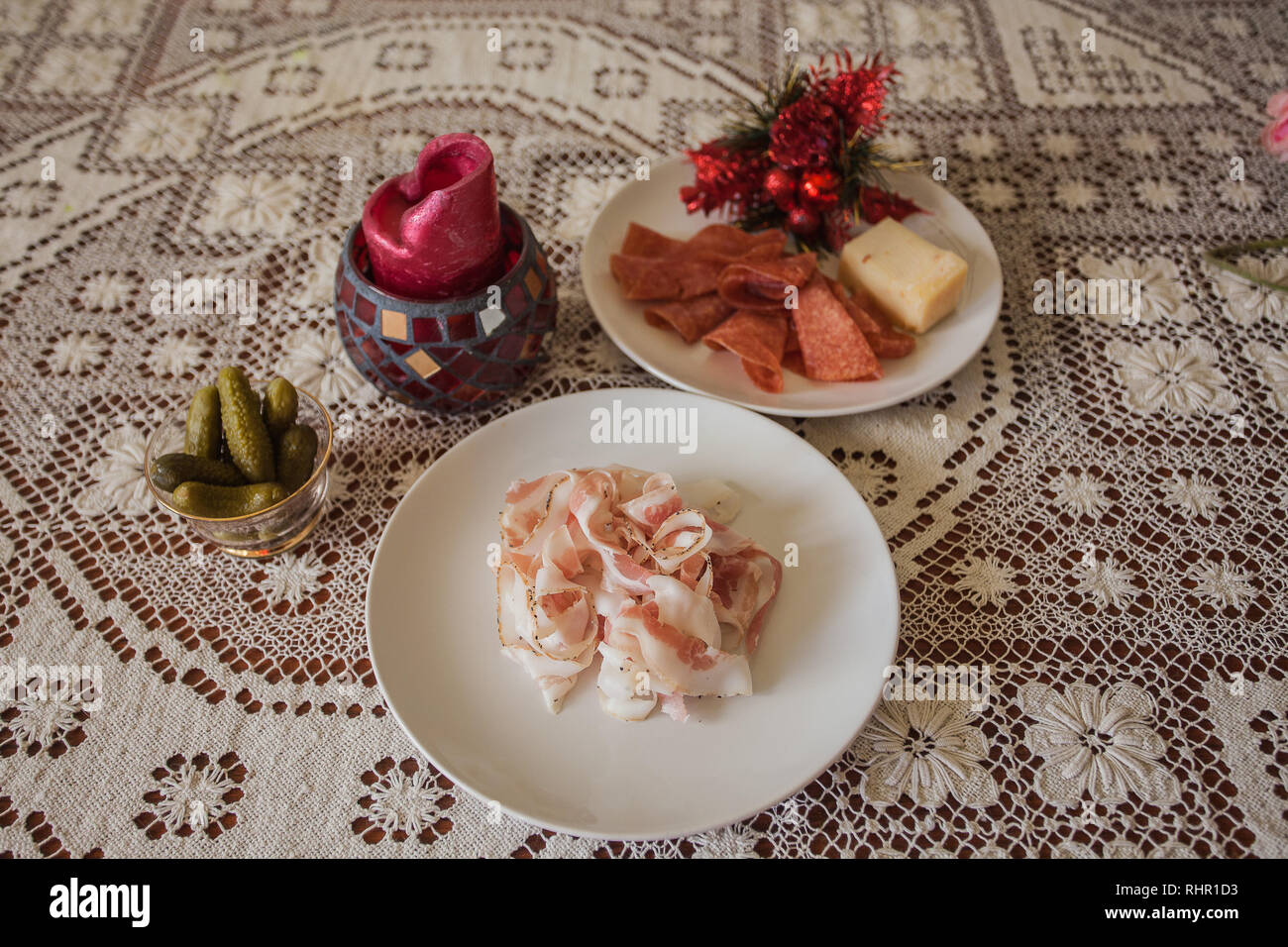 Italian salami on an elegant table with natural light Stock Photo - Alamy