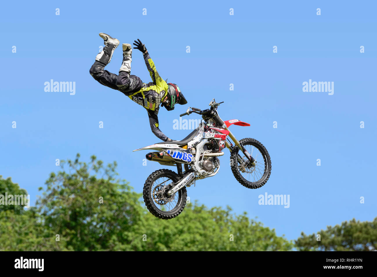 A motorbike rider from Honda’s Bold Dog Lings Freestyle Motocross ...