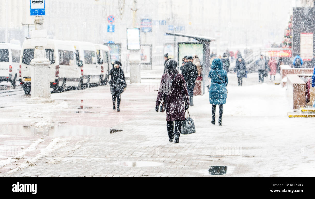 Blizzard in an Urban Environment. Crowd of Rushing People in Snowfall ...
