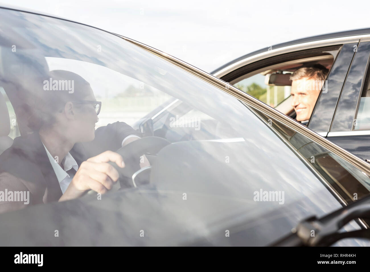Two people talking car hi-res stock photography and images - Alamy