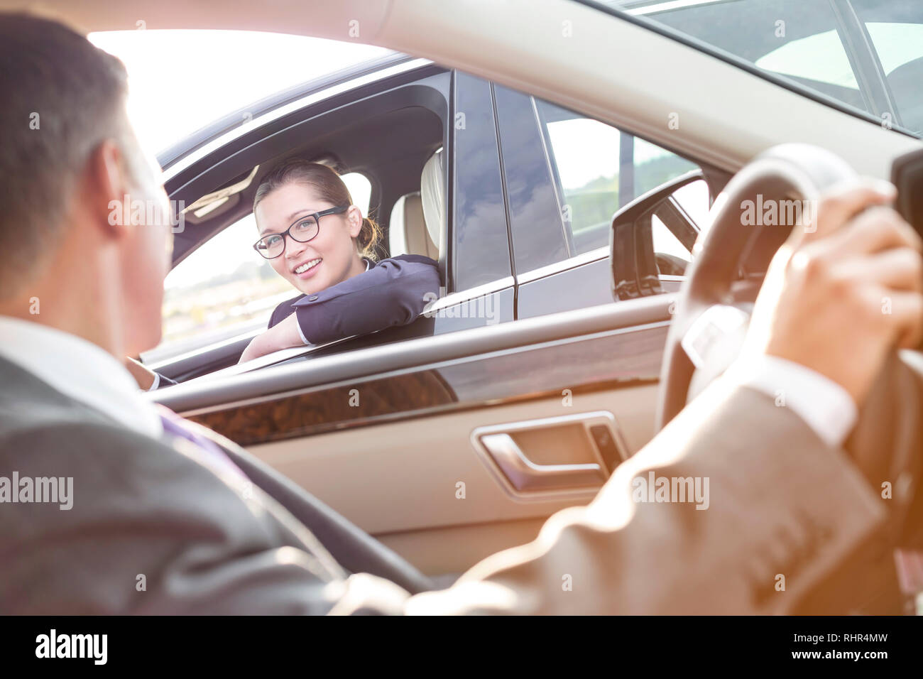 Two people talking car hi-res stock photography and images - Alamy
