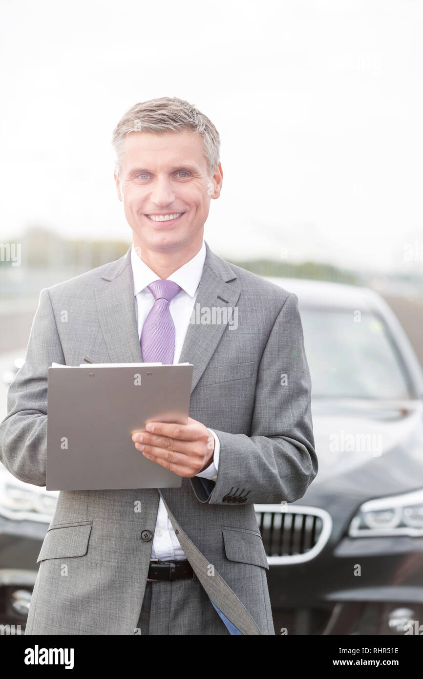 Standing smiling car transportation hi-res stock photography and images ...