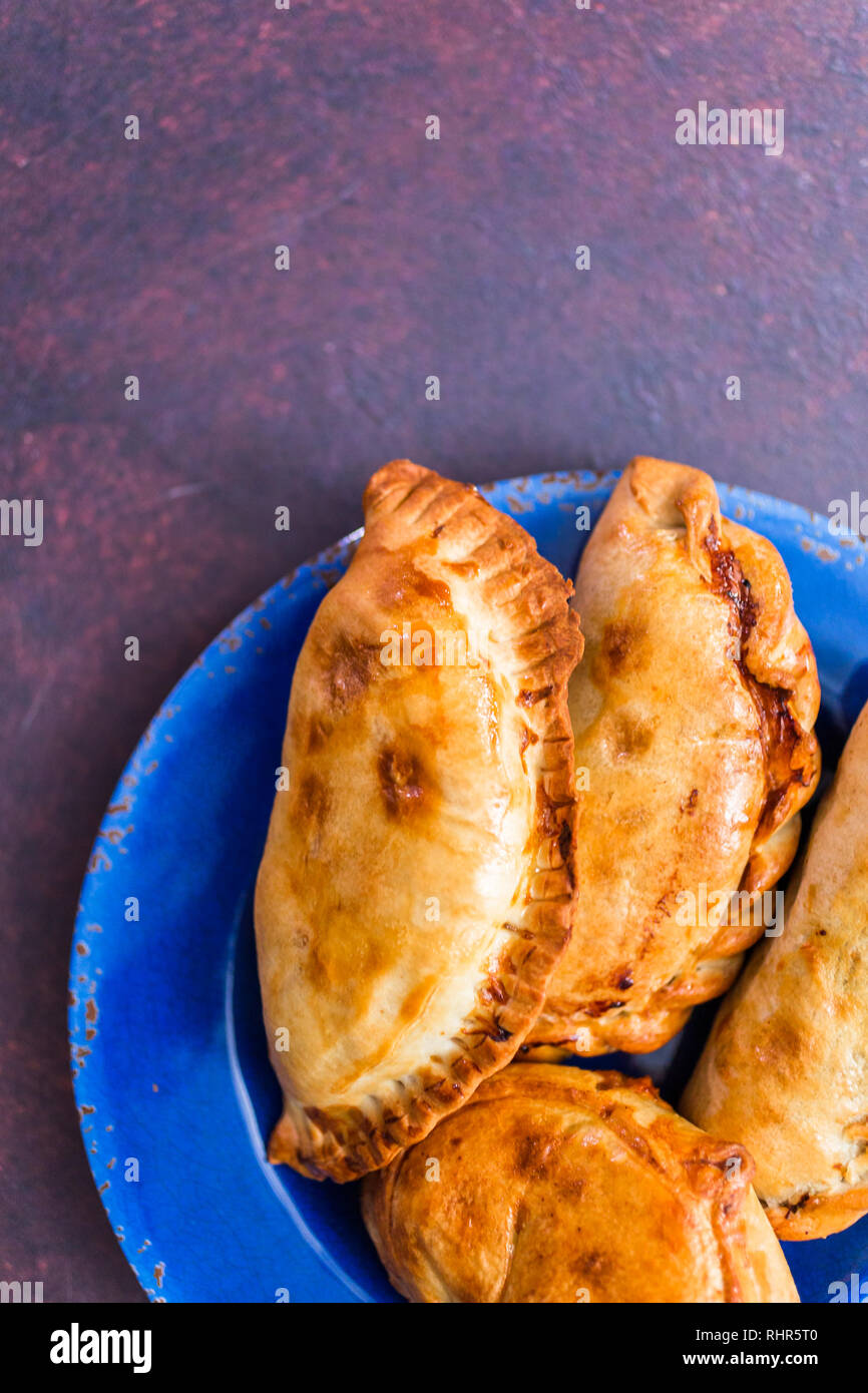 Homemade large empanadas with different staffings Stock Photo - Alamy