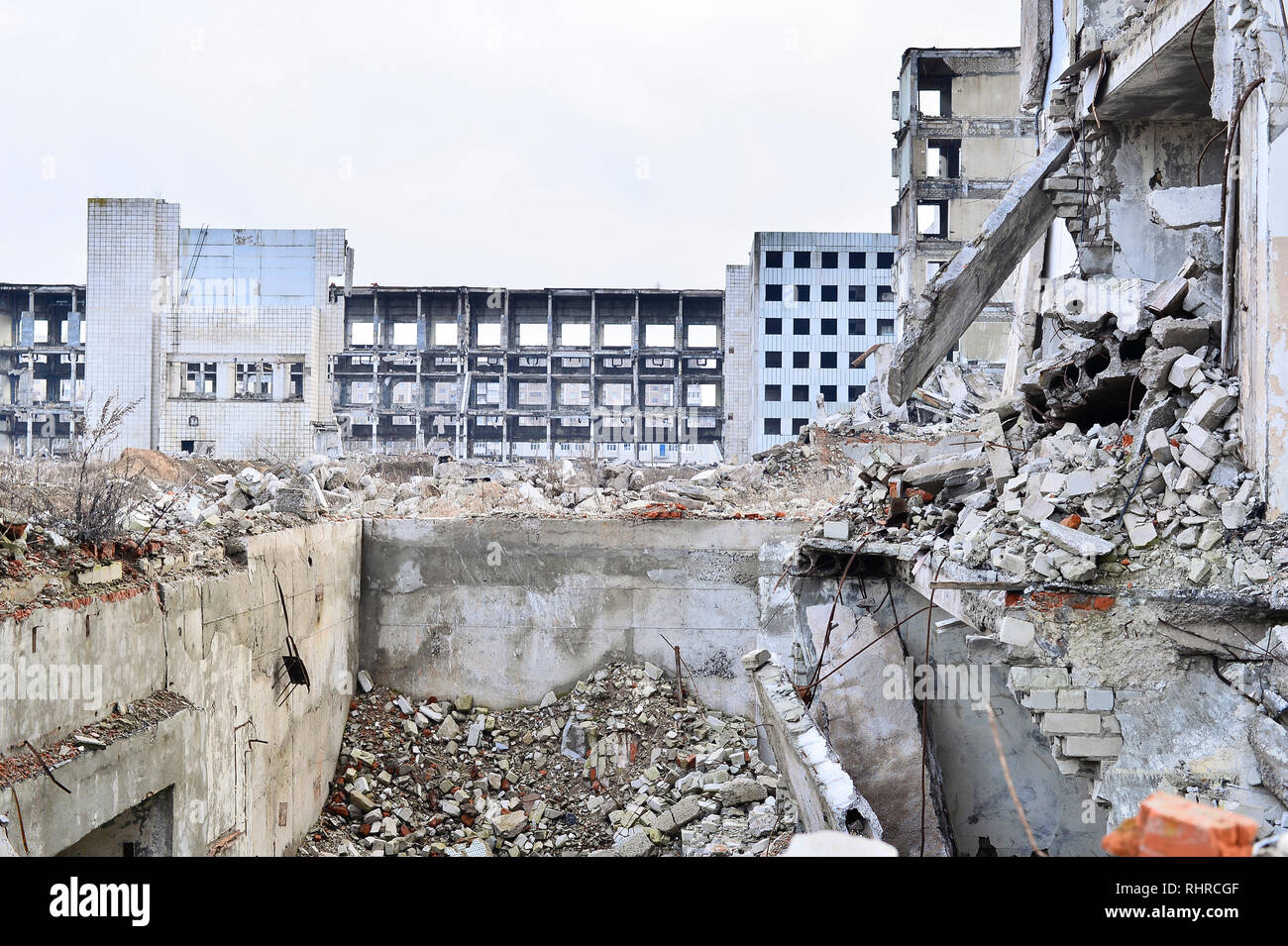 Remains of the destroyed industrial building. Background Stock Photo ...