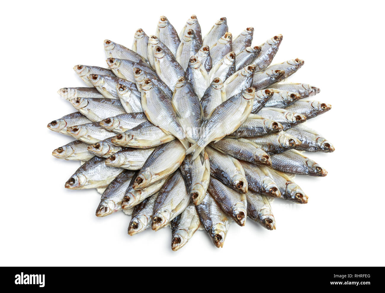 Large heap of dried salted sea roach laid out in the form of a circle ...