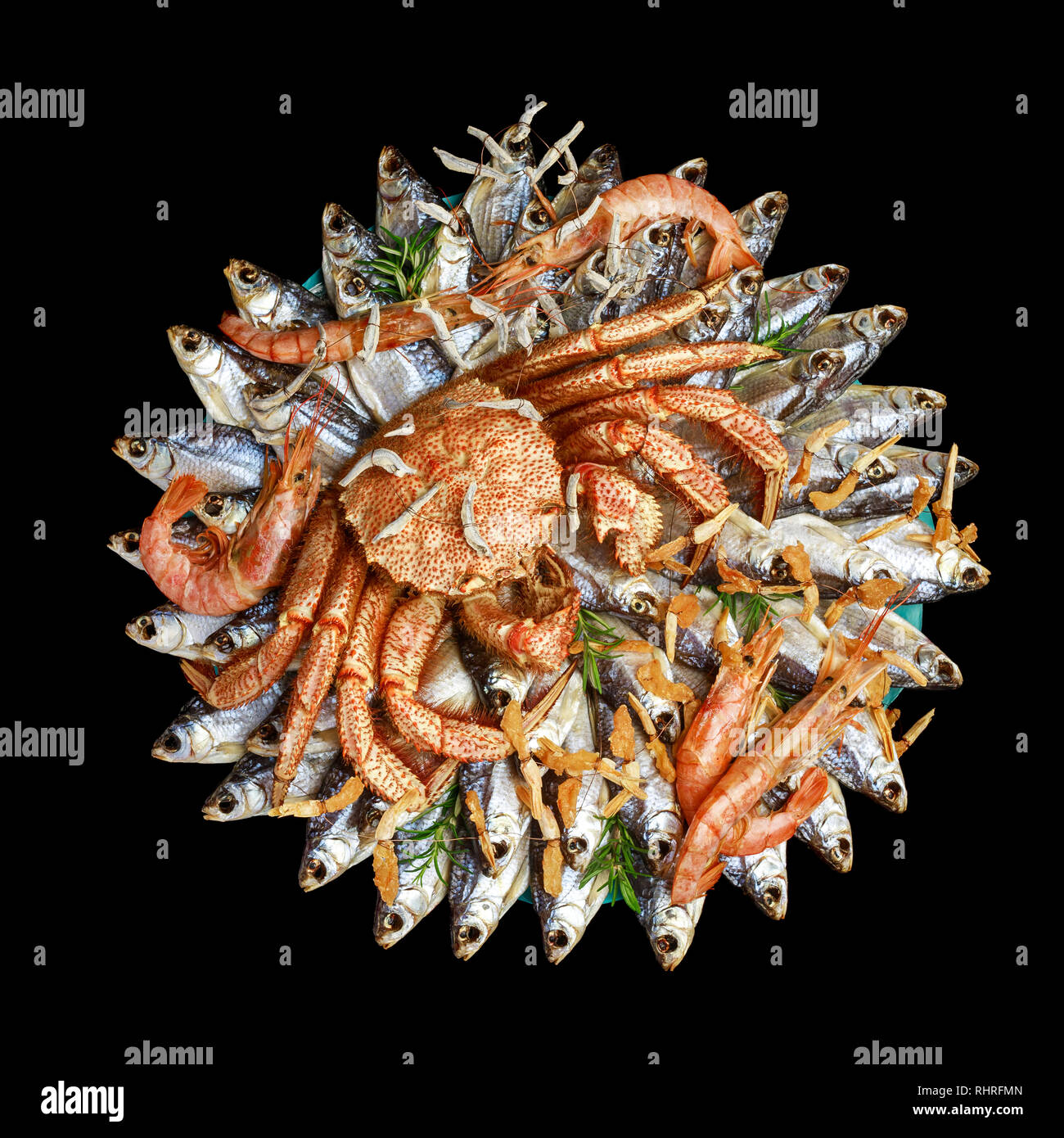 Big hairy boiled crab sits on a heap of dried salted fish on a gift ...