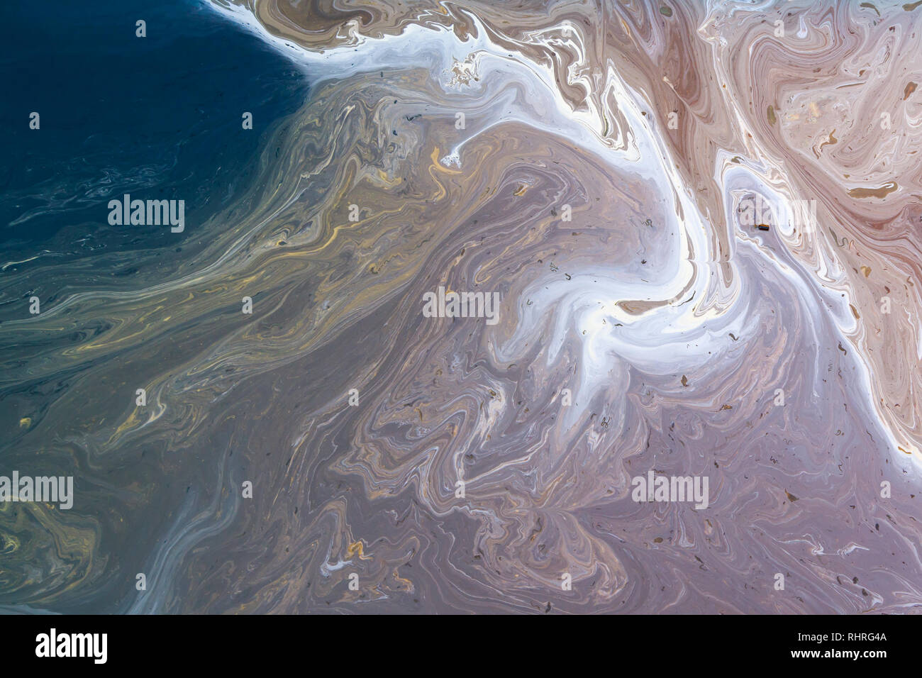 Oil polluted ocean surface as background or backdrop Stock Photo - Alamy