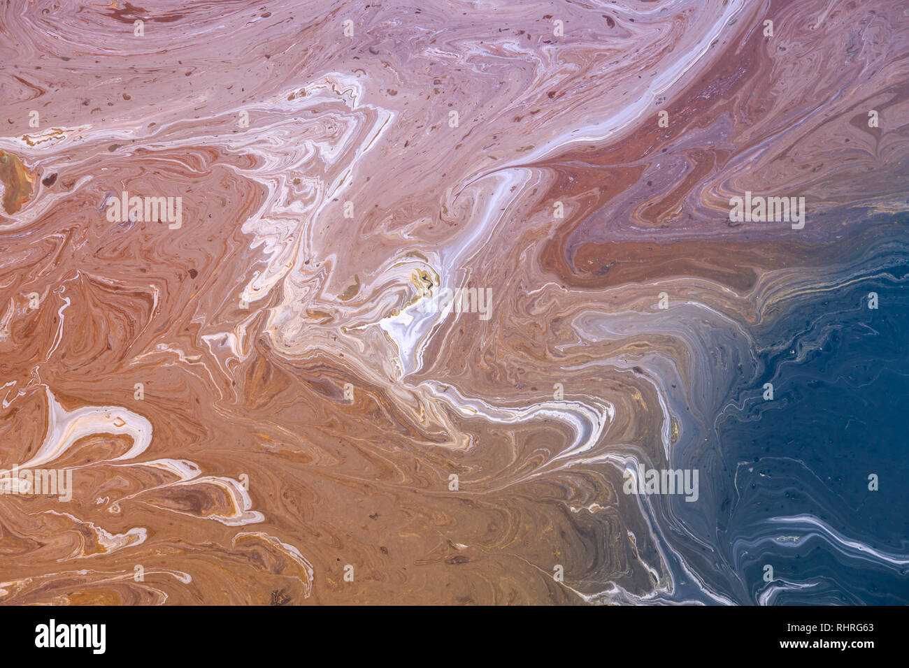 Oil polluted sea surface as background or backdrop Stock Photo - Alamy