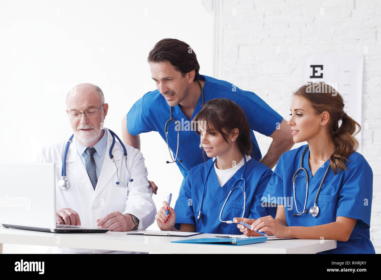 Medical doctors team using laptop hi-res stock photography and images ...