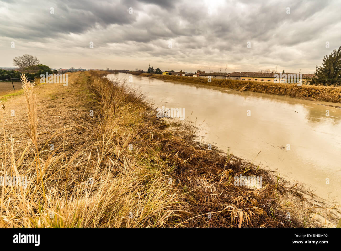 astonishing view of slimy waters of river in flood in Italian ...