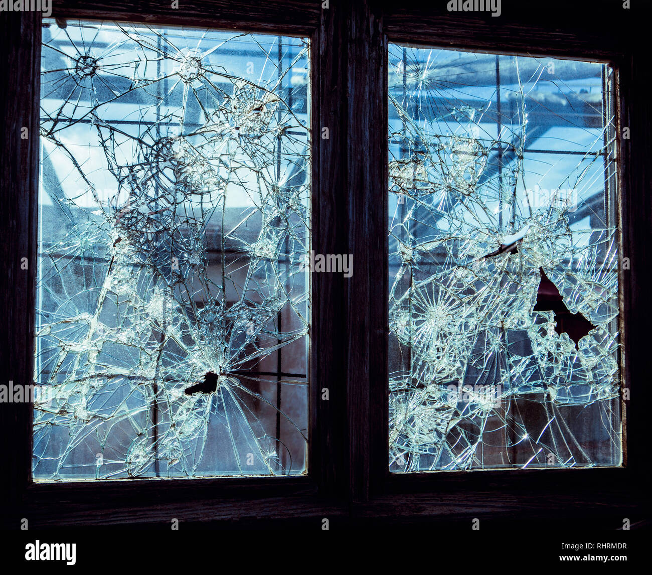old window of an abandoned house with broken glass Stock Photo - Alamy