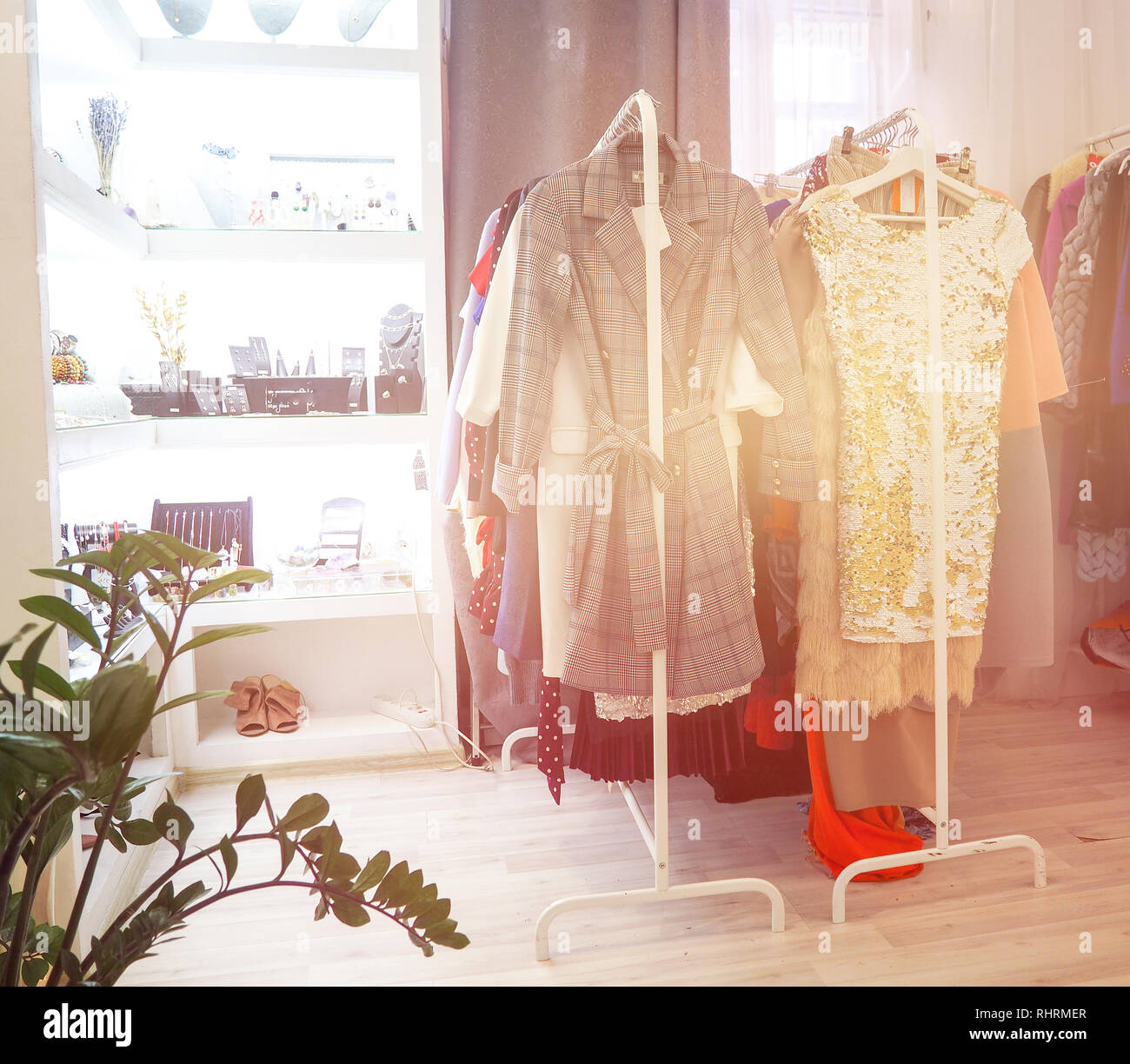 blurred clothes on hanger in clothing store. Abstract blur and ...