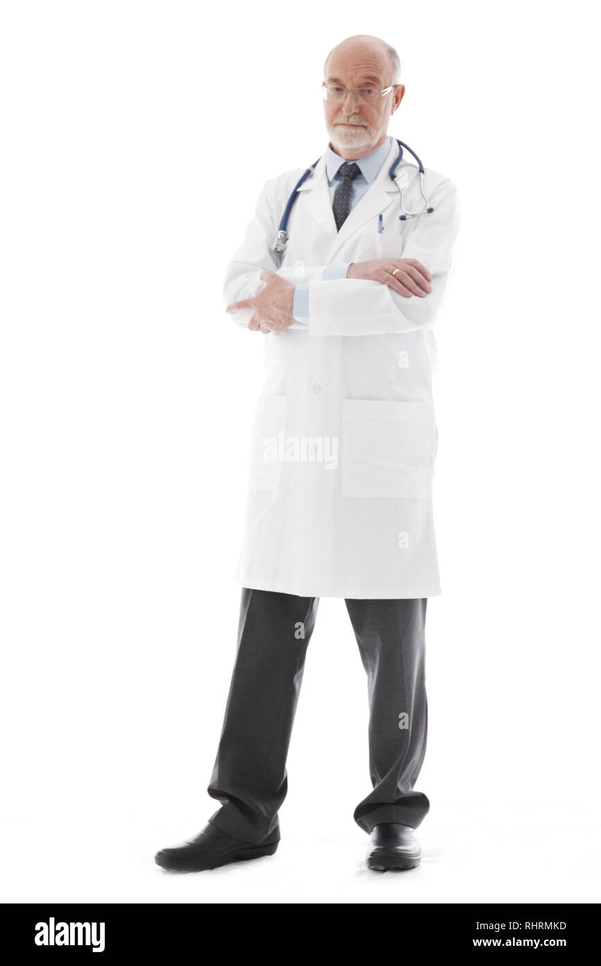Full length portrait of a mature doctor isolated on white background ...