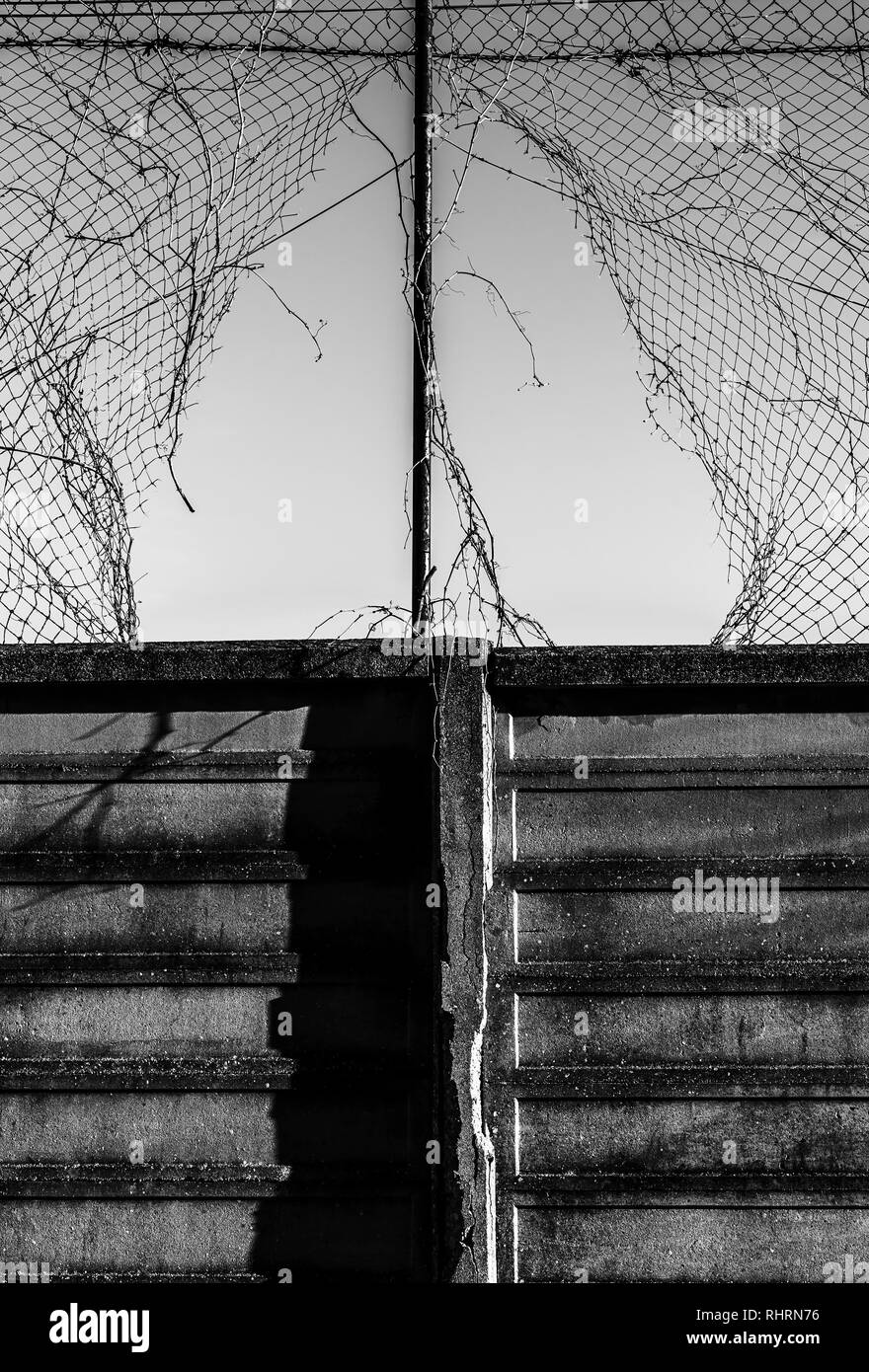 Broken mesh fence Black and White Stock Photos & Images - Alamy