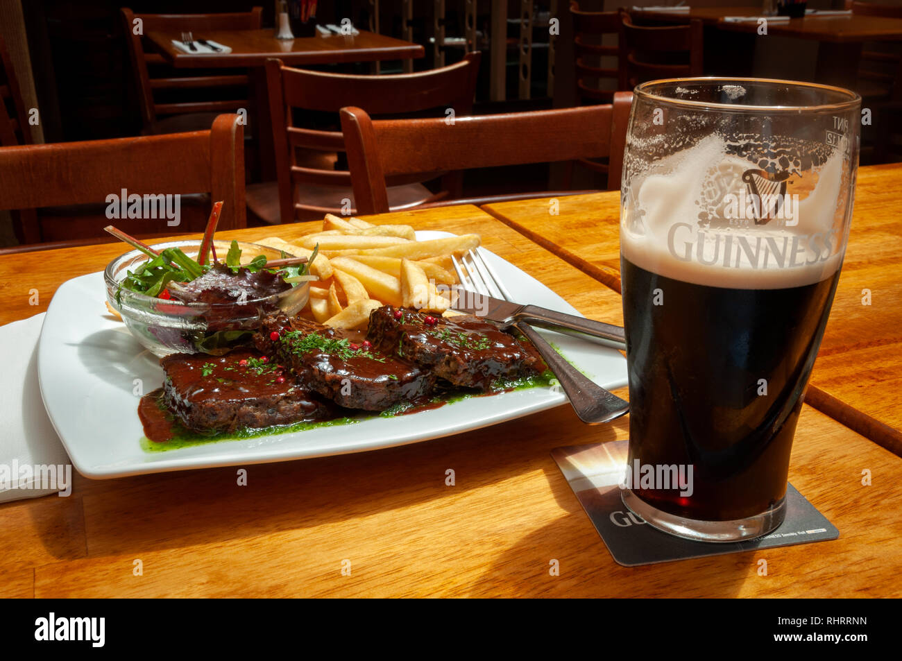 Guinness on table hi-res stock photography and images - Alamy