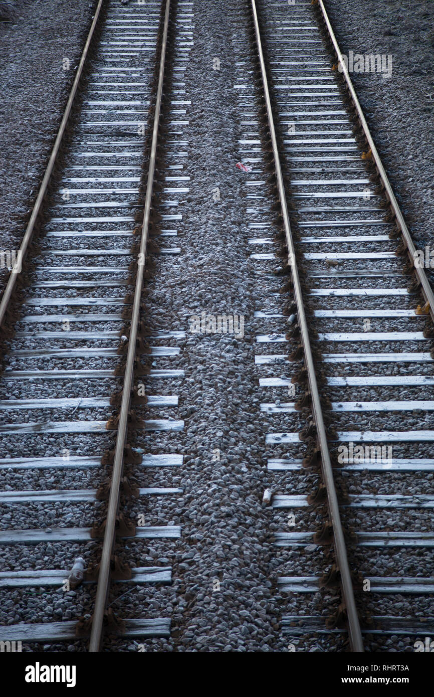 Winter rail travel railway line with sleepers covered in frostwinter hi ...