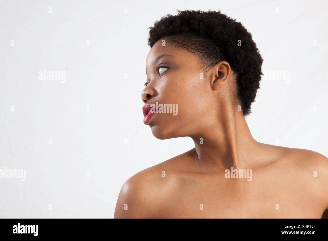 Lovely Black woman with bare shoulders Stock Photo - Alamy