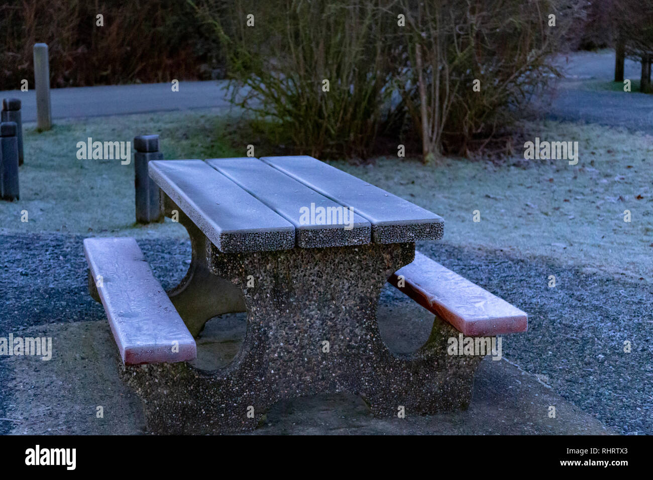 Frost covered picnic table Stock Photo - Alamy