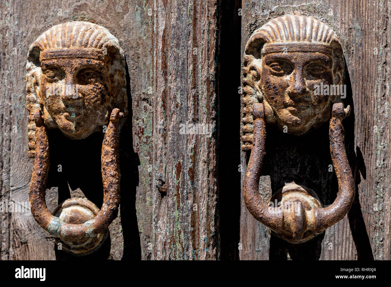 Old Greek Door with Egyptian Iron Door Knockers Stock Photo - Alamy
