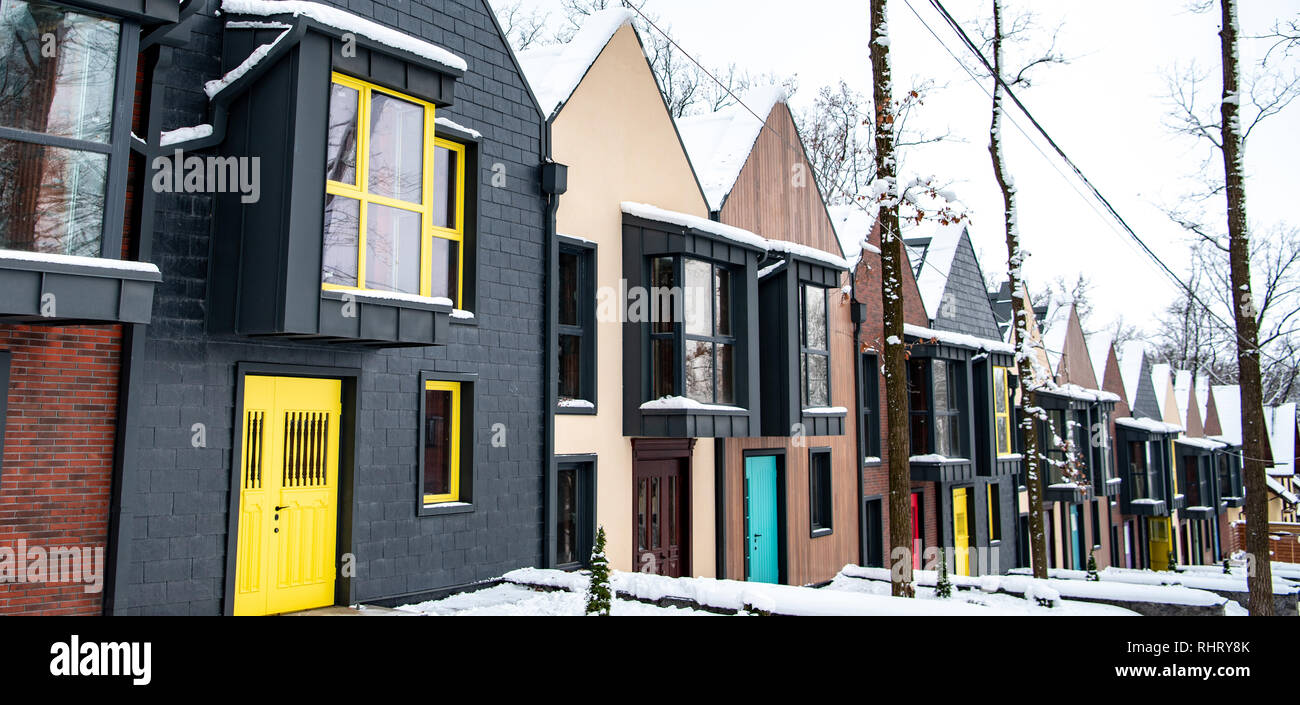 fancy modern houses in cold winter with snow on ground Stock Photo - Alamy