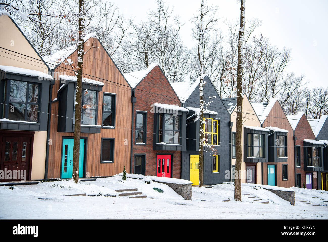 fancy modern buildings in cold winter with snow on roofs Stock Photo ...