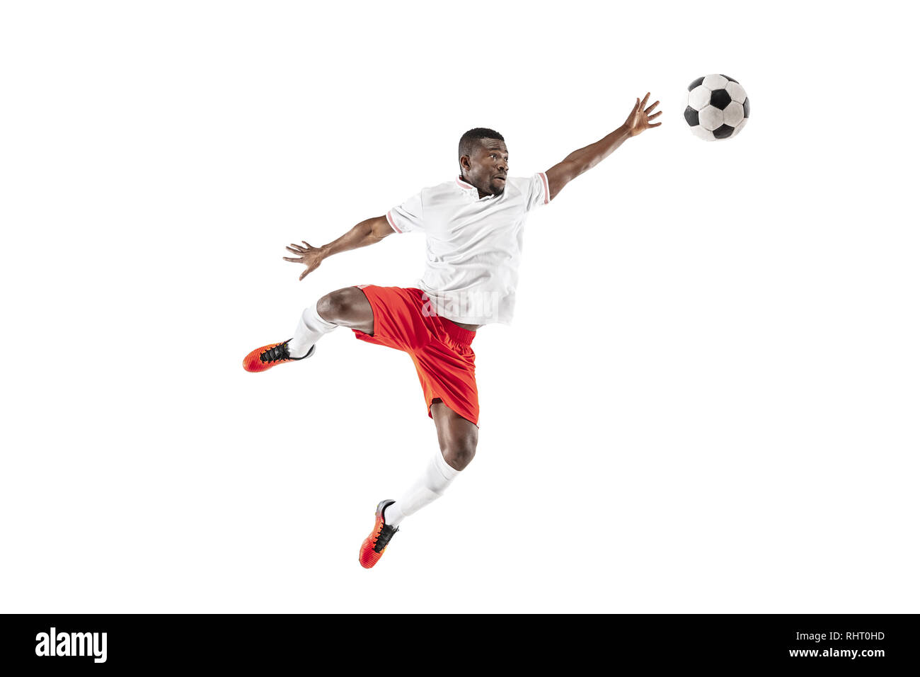 Professional african american football soccer player in motion isolated ...