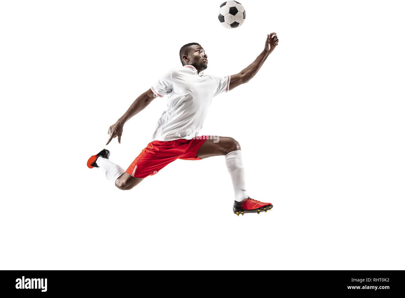 Professional african american football soccer player in motion isolated ...