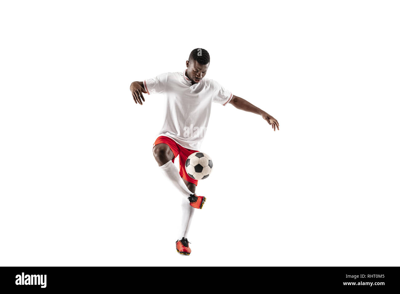 Professional african american football soccer player in motion isolated ...