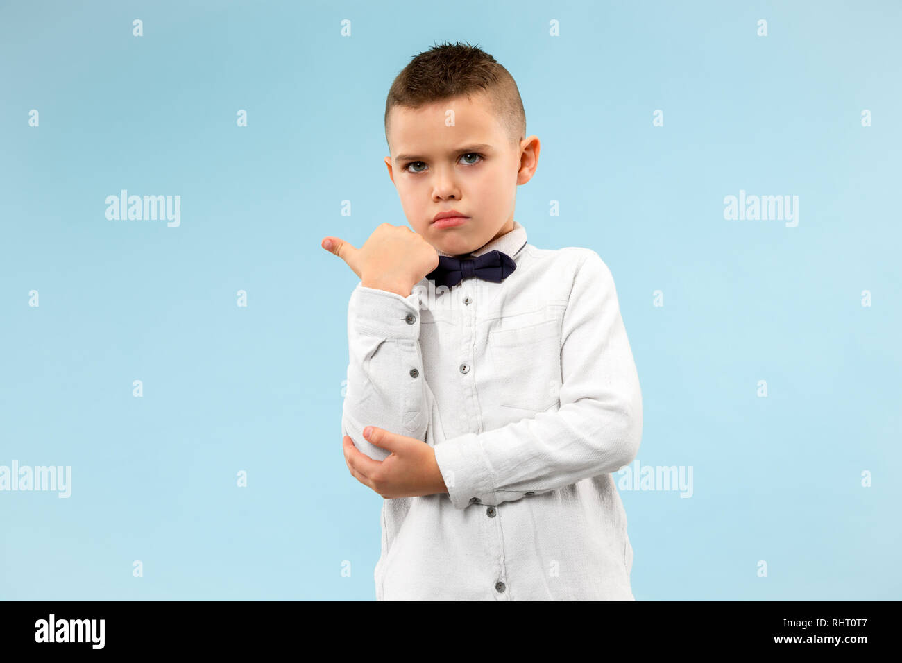 Secret, gossip concept. Teen boy whispering a secret behind his hand ...