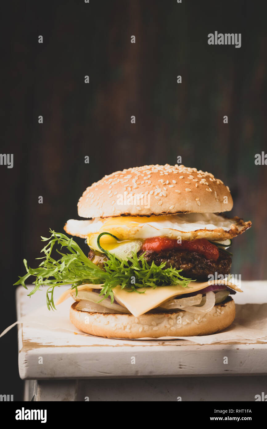 Fresh rustic burger Stock Photo - Alamy