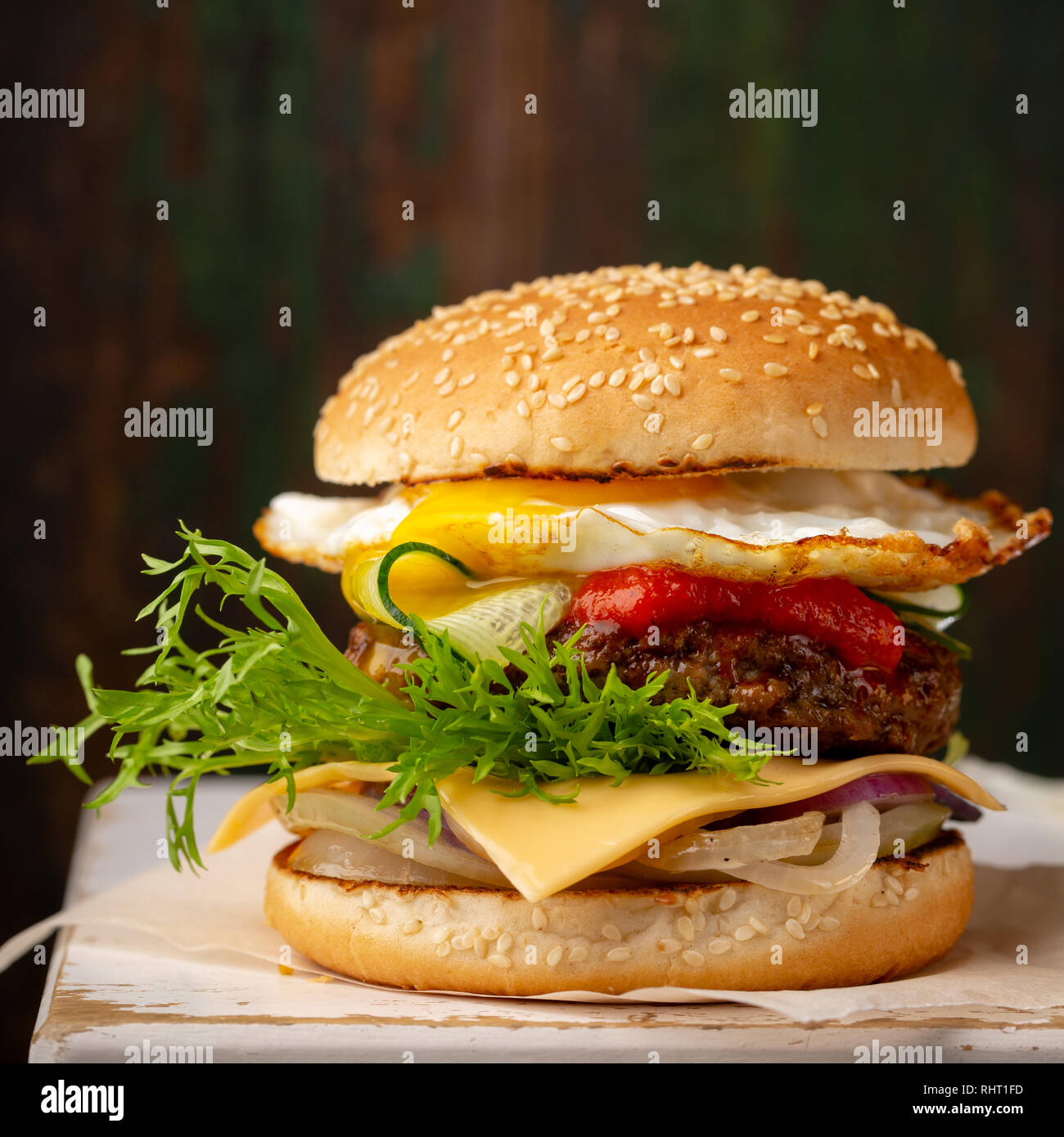 Fresh rustic burger close-up Stock Photo - Alamy