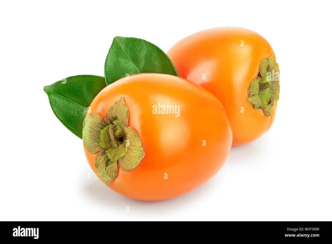 Persimmon fruit with leaves isolated on white background close-up Stock ...