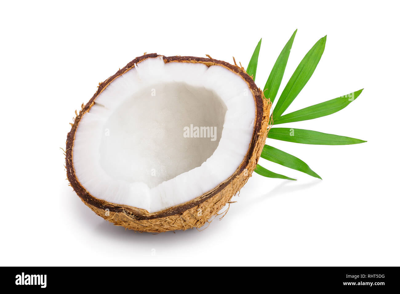 half of coconut with leaves isolated on white background Stock Photo ...