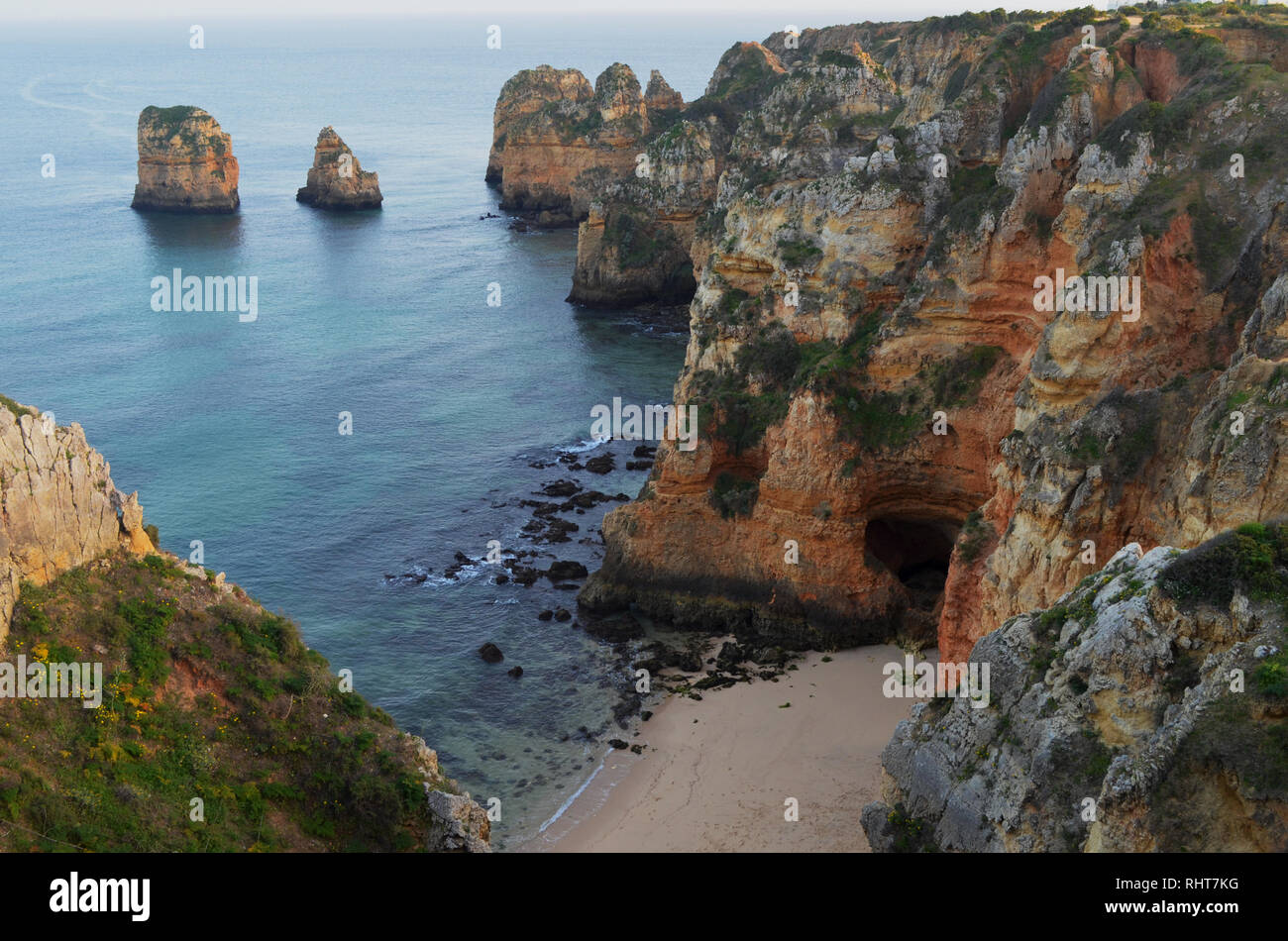 Coastal cliffs and sandy beaches in Lagos, Algarve (southern Portugal ...
