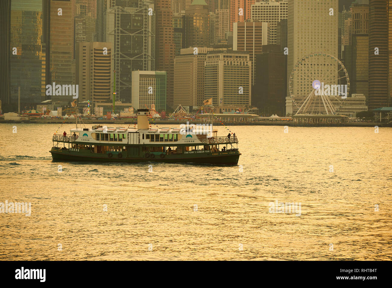 HONG KONG - JANUARY 25, 2016: A Star Ferry carries passengers around ...