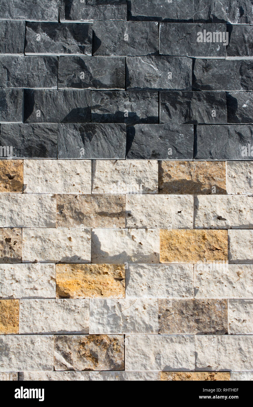 Decorative cubic stone wall as background texture Stock Photo - Alamy