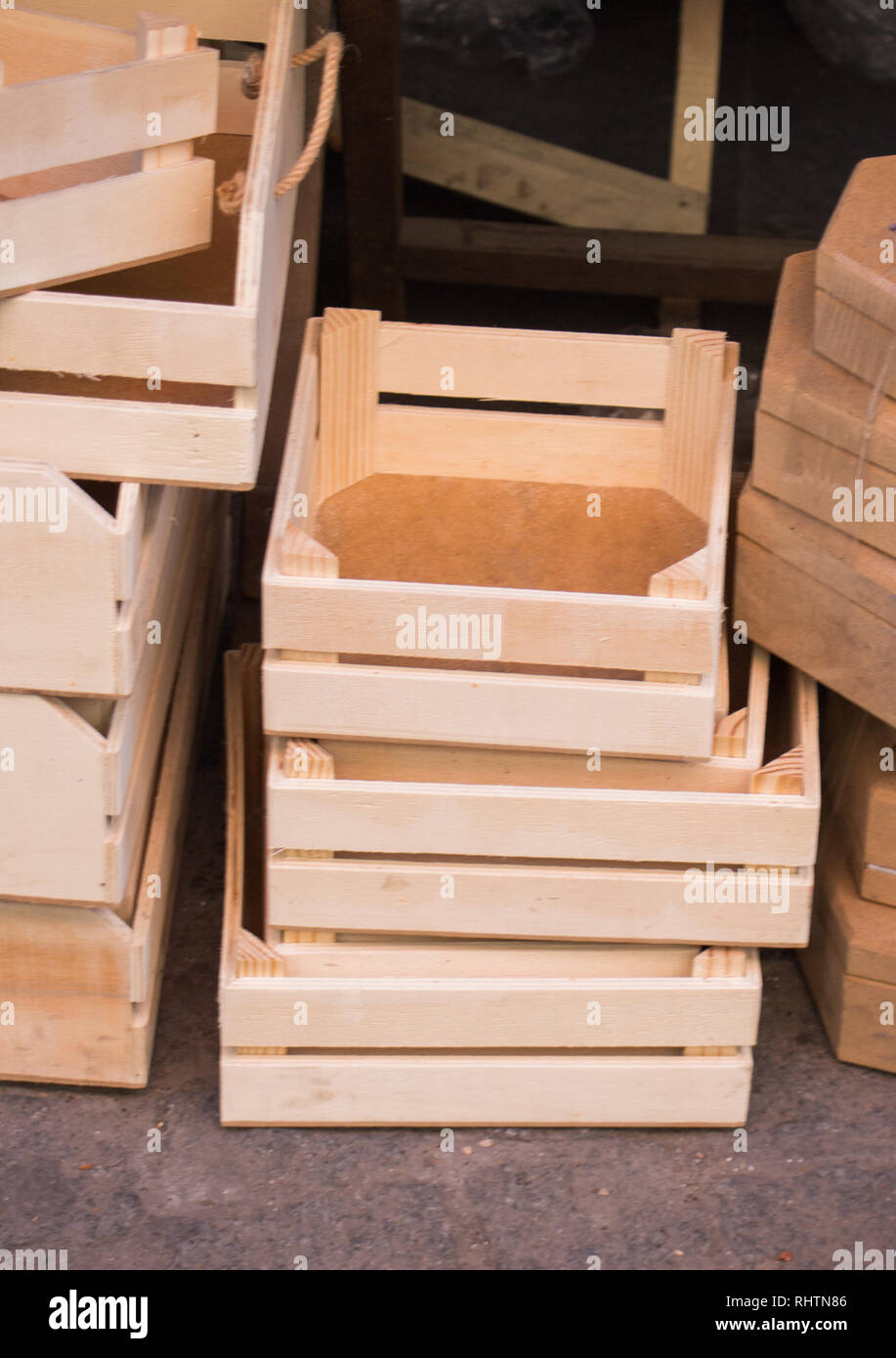 Wooden empty crate boxes for sale in a market place Stock Photo - Alamy