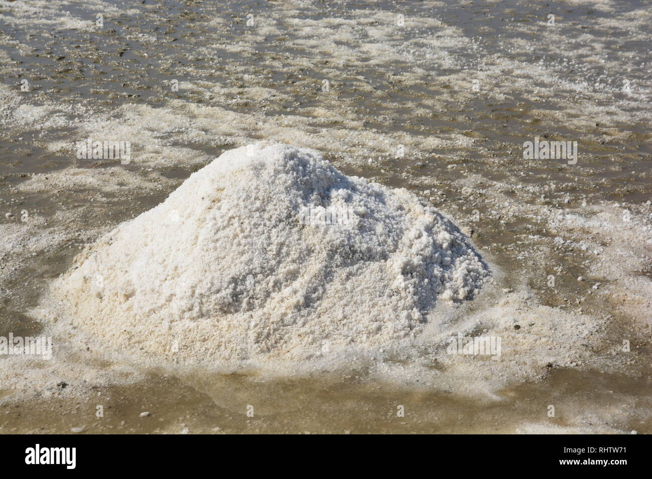 Salt pile in salt farm Stock Photo - Alamy