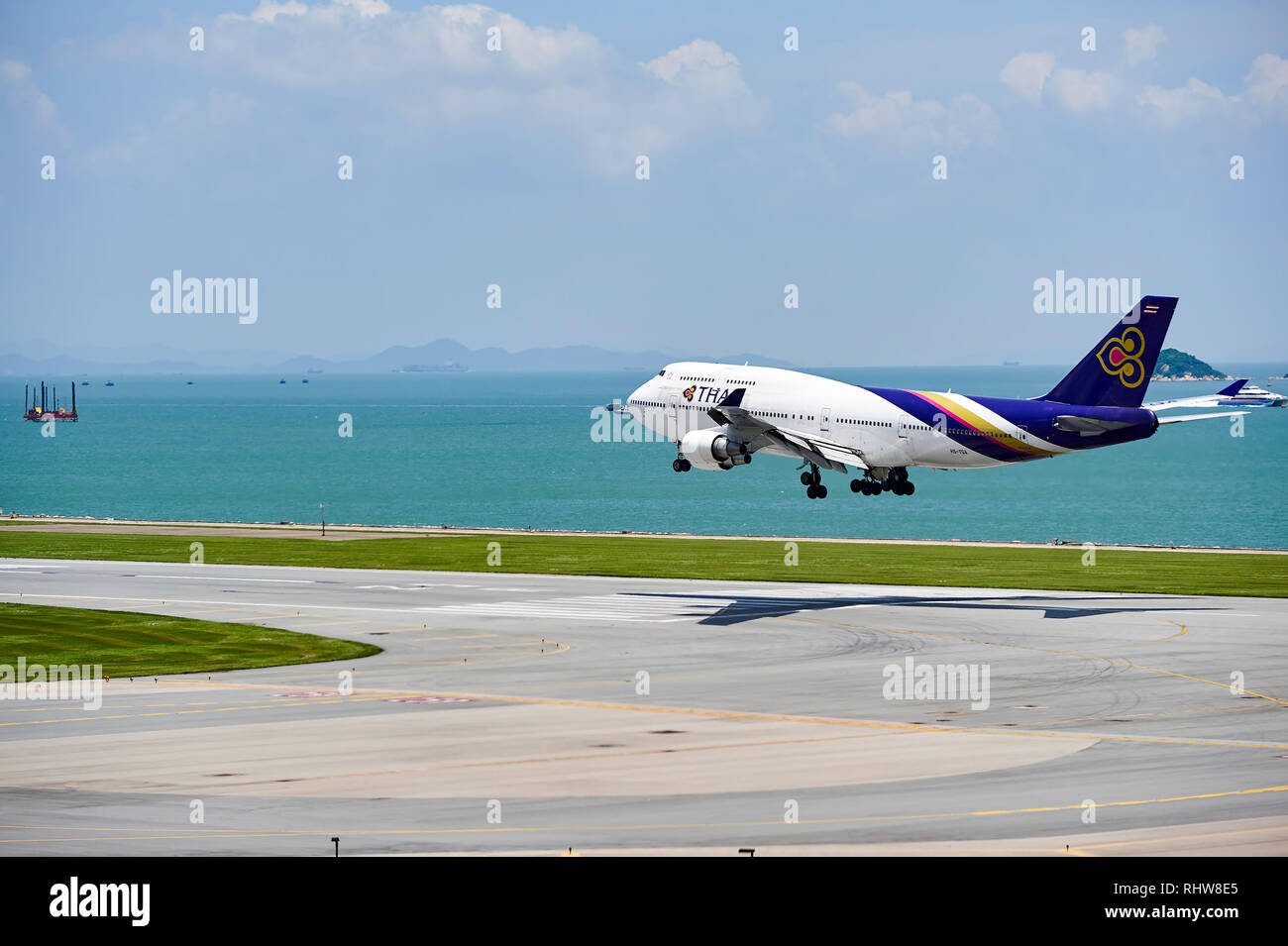 HONG KONG - JUNE 04, 2015: THAI aircraft landing at Hong Kong airport ...