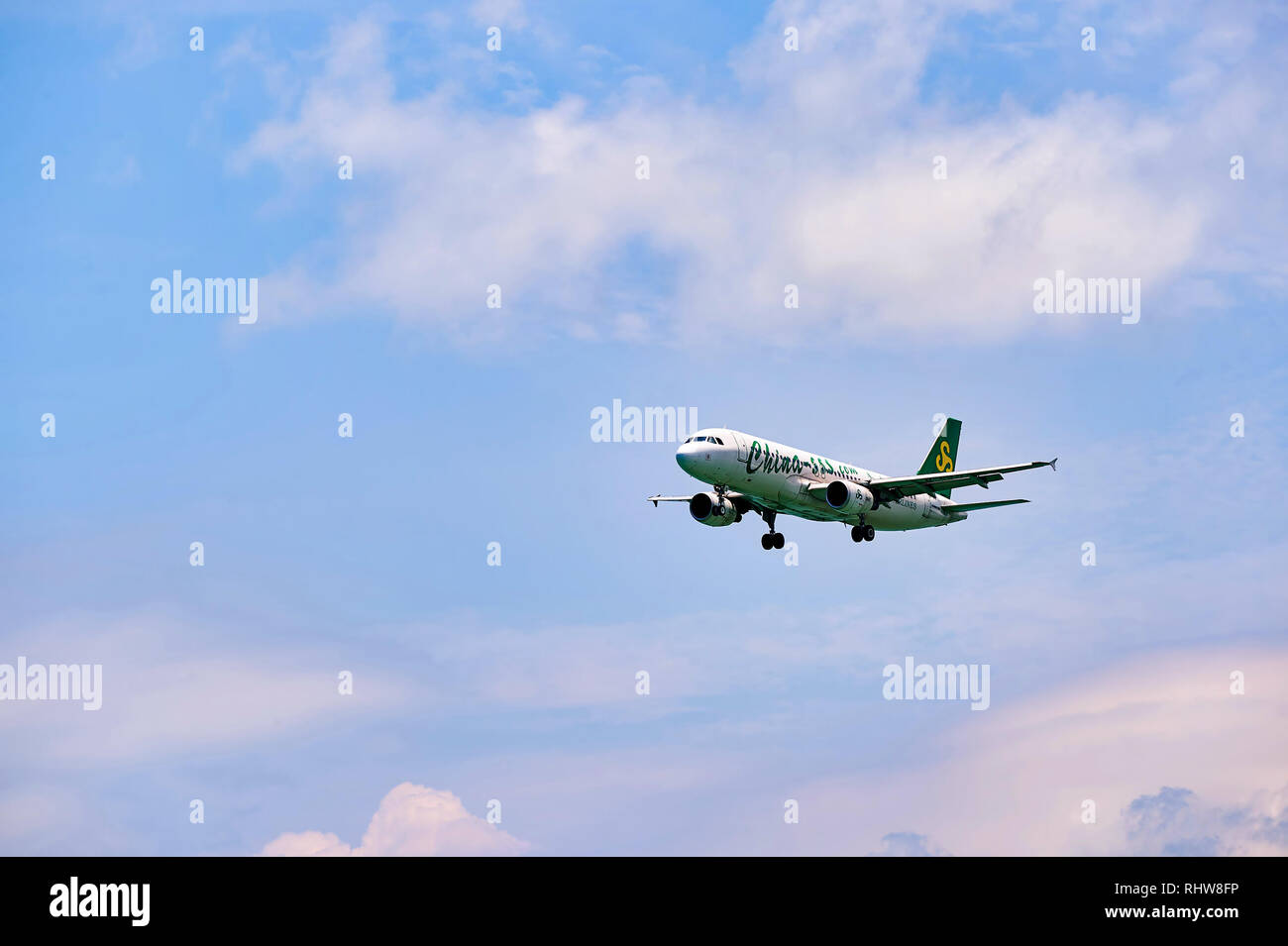 HONG KONG - JUNE 04, 2015: Spring Airlines aircraft landing at Hong ...