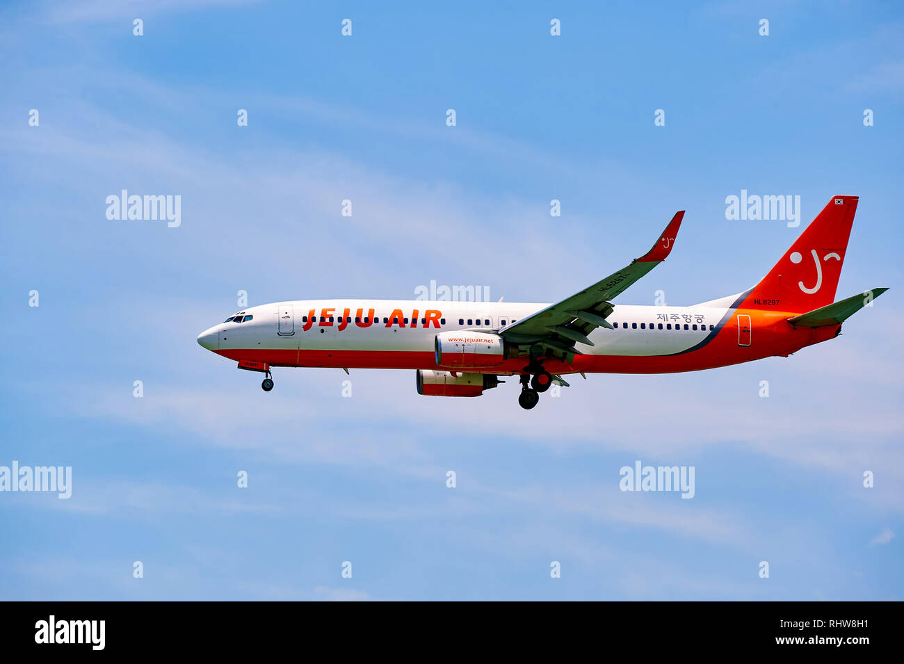 HONG KONG - JUNE 04, 2015: Jeju Air aircraft landing at Hong Kong ...