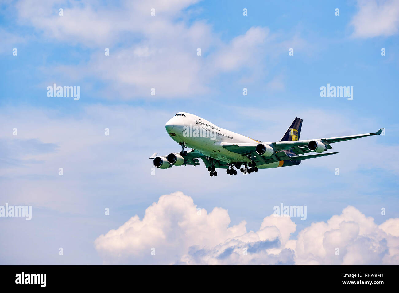 HONG KONG - JUNE 04, 2015: UPS Boeing 747 landing at Hong Kong airport ...