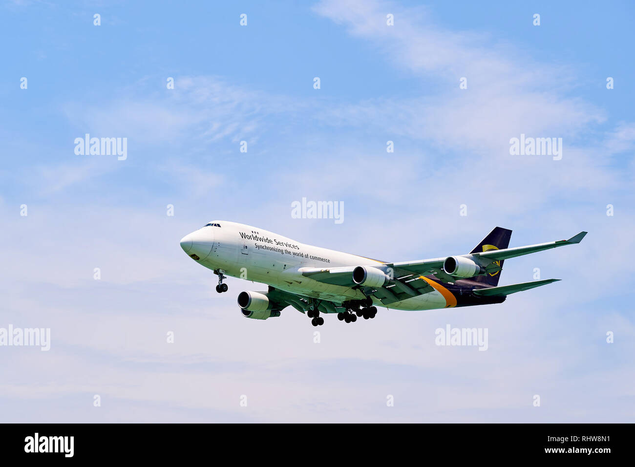 HONG KONG - JUNE 04, 2015: UPS Boeing 747 landing at Hong Kong airport ...