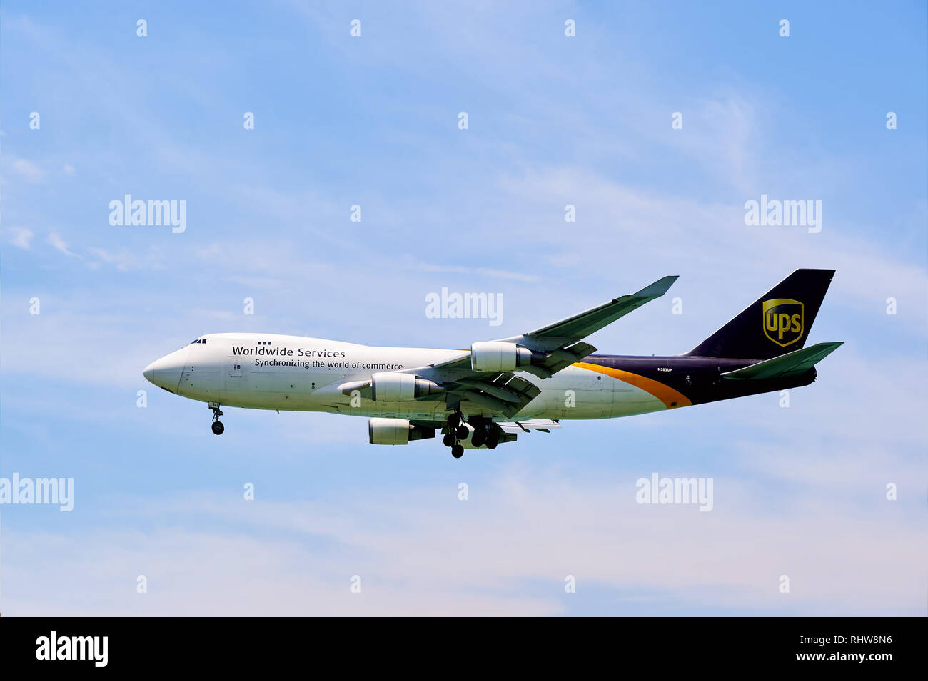 HONG KONG - JUNE 04, 2015: UPS Boeing 747 landing at Hong Kong airport ...