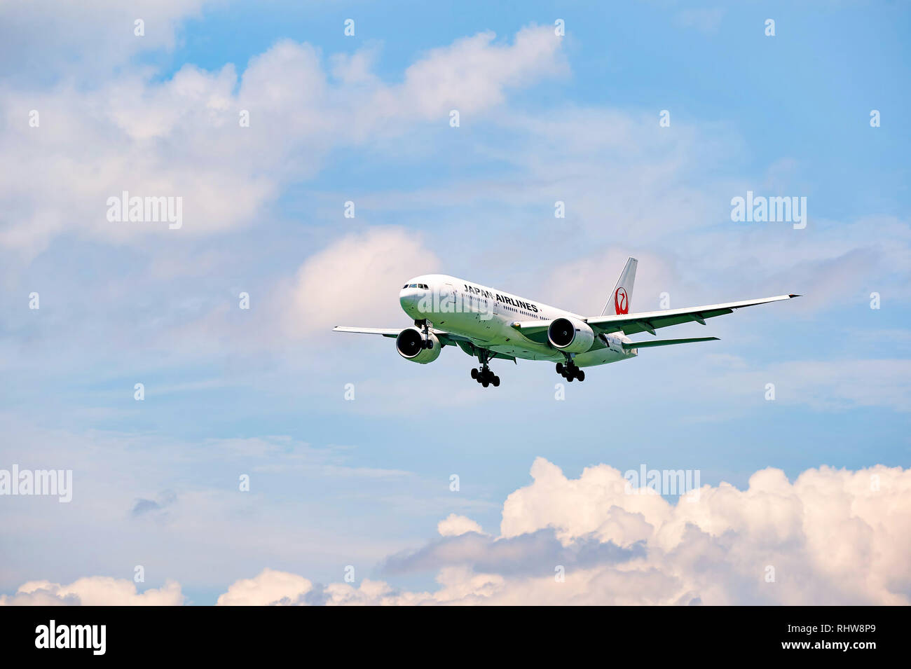 HONG KONG - JUNE 04, 2015: JAL aircraft landing at Hong Kong airport ...