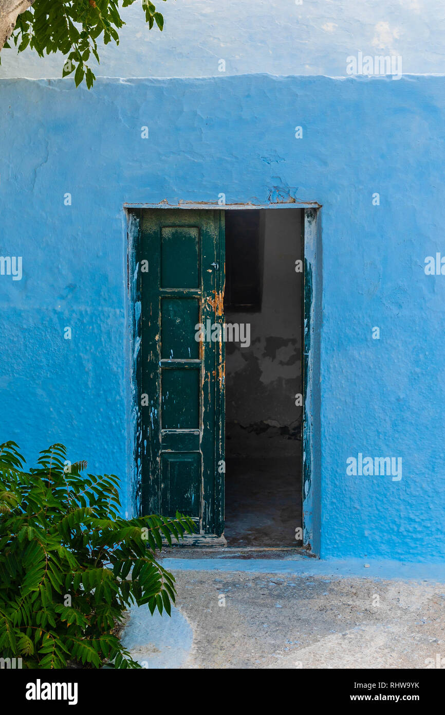 Open door into a traditional Greek house, Parque Oya Park, Oia ...