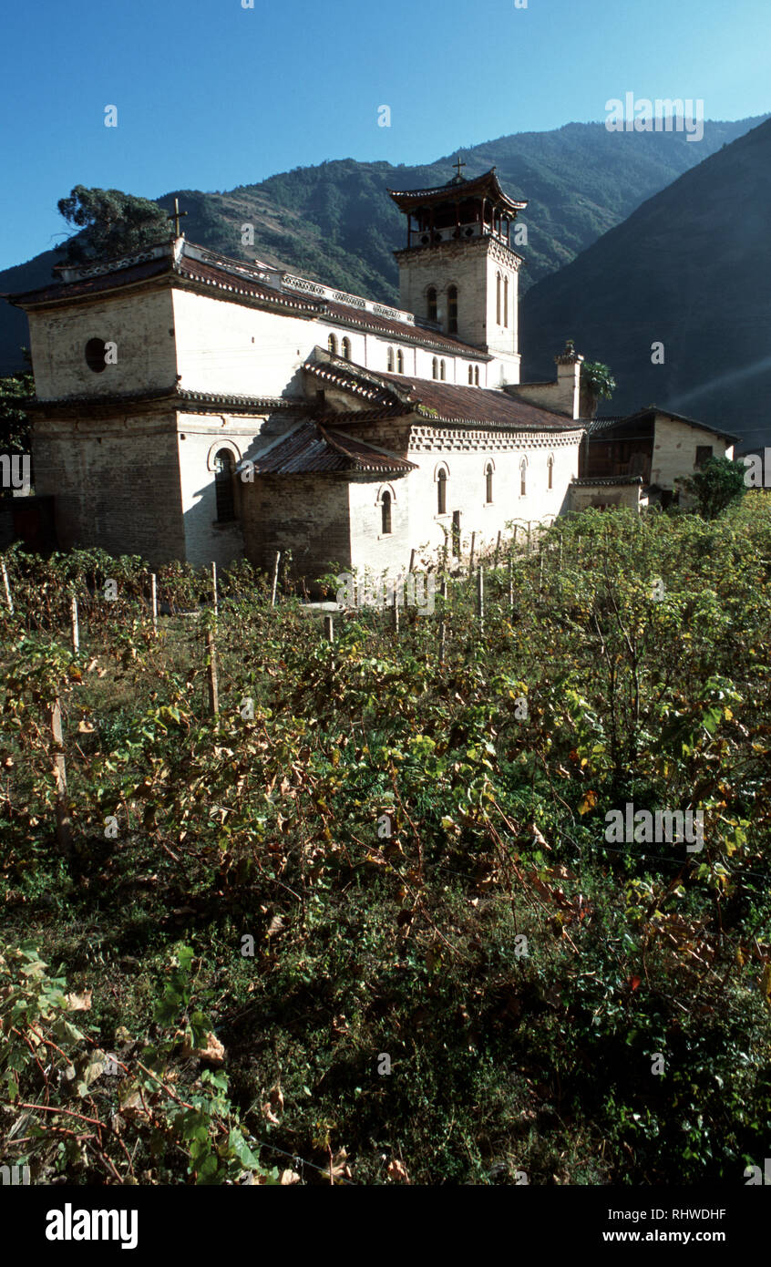 A Catholic church sits amongst mature grape vines in the small Mekong ...