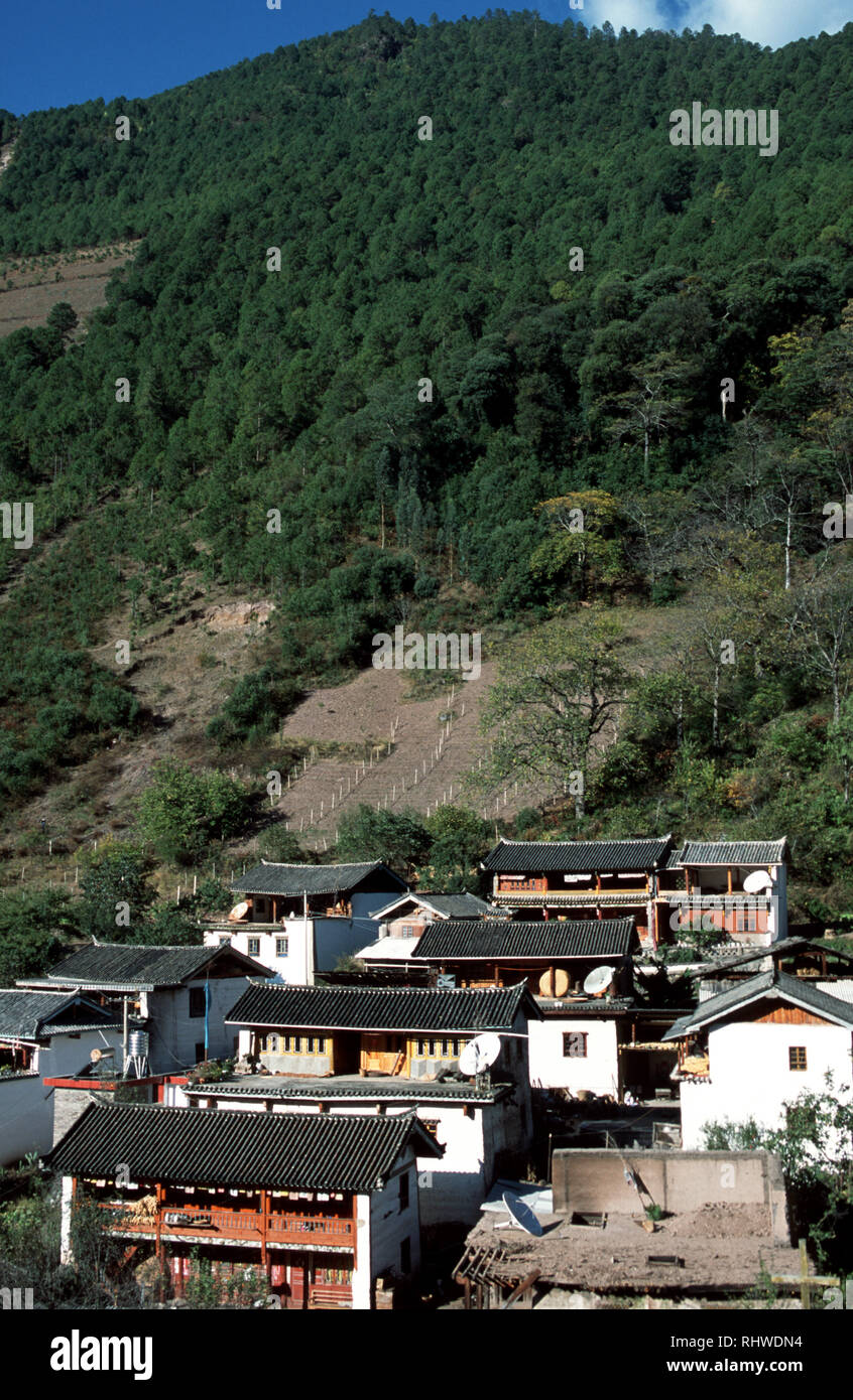 Satellite dishes beaming to the skies in Cizhong, a small Mekong River ...