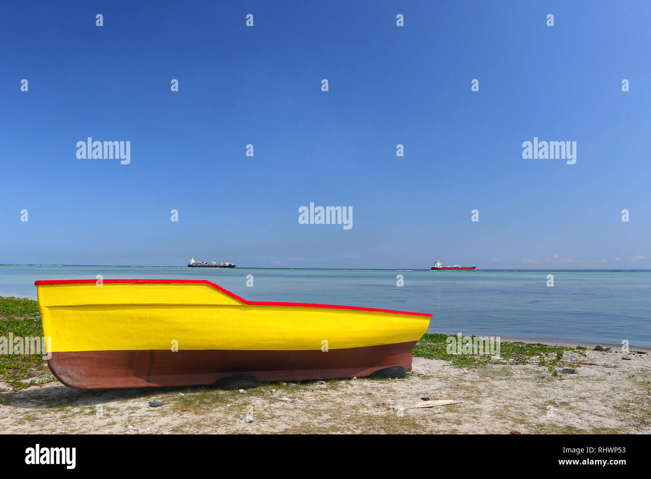 Yellow boat ashore, Mauritius Stock Photo - Alamy